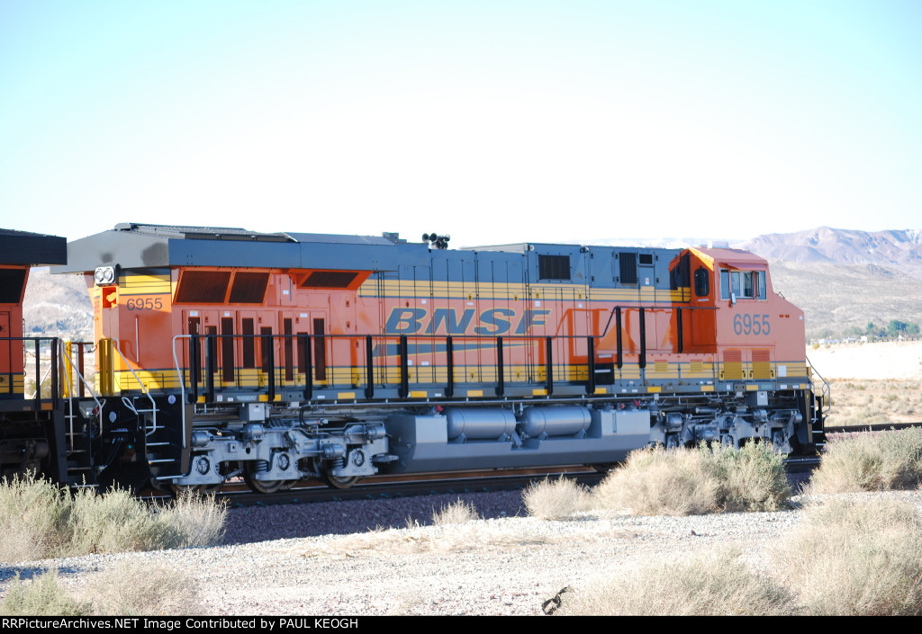 Rear Shot off BNSF 6955 as the setting sun cast her shadows on her Very New BNSF/GE Swoosh Paint ...